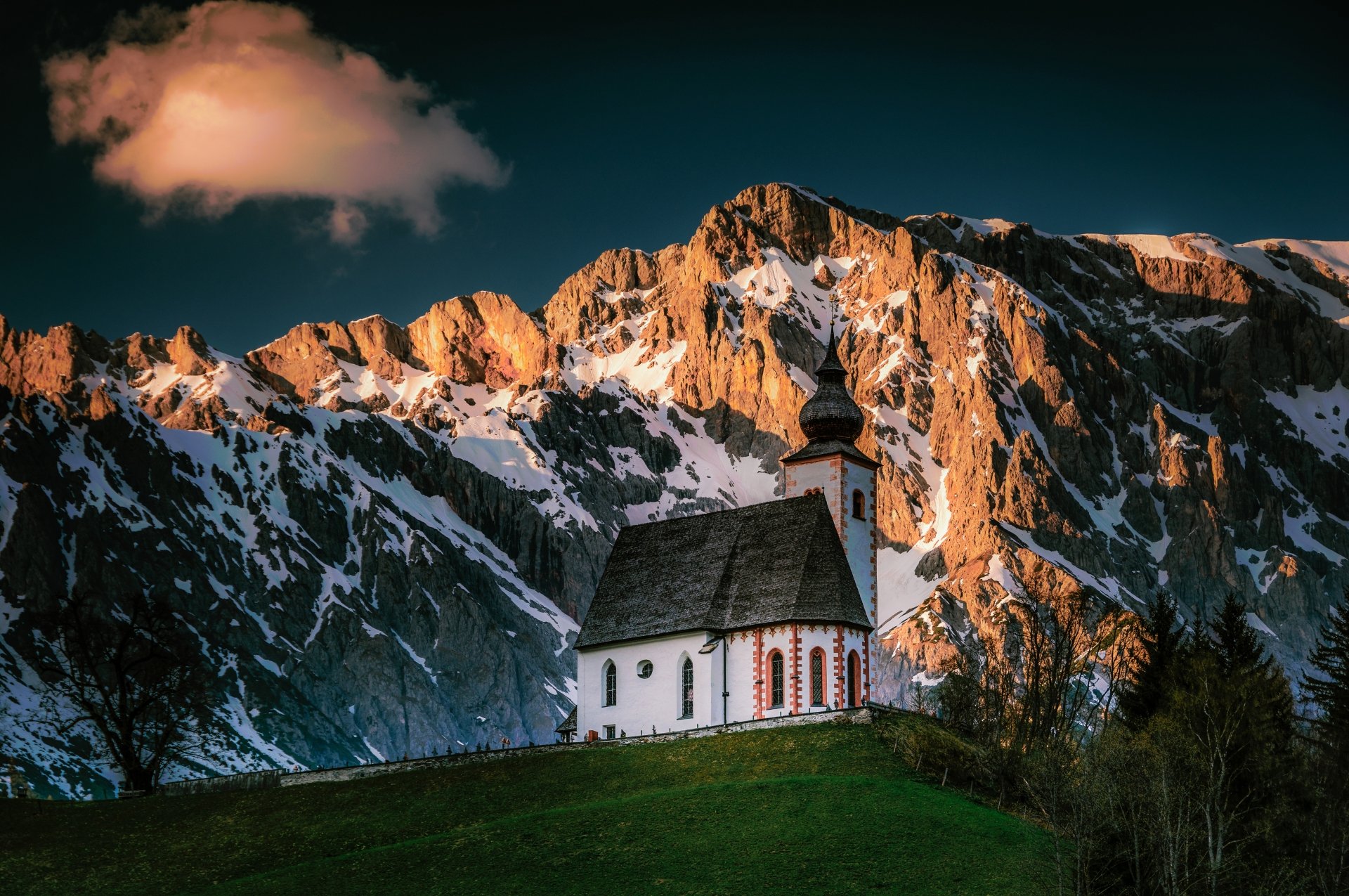 Alpine Serenity: Austrian Church Amidst Snowy Alps in 4K Ultra HD