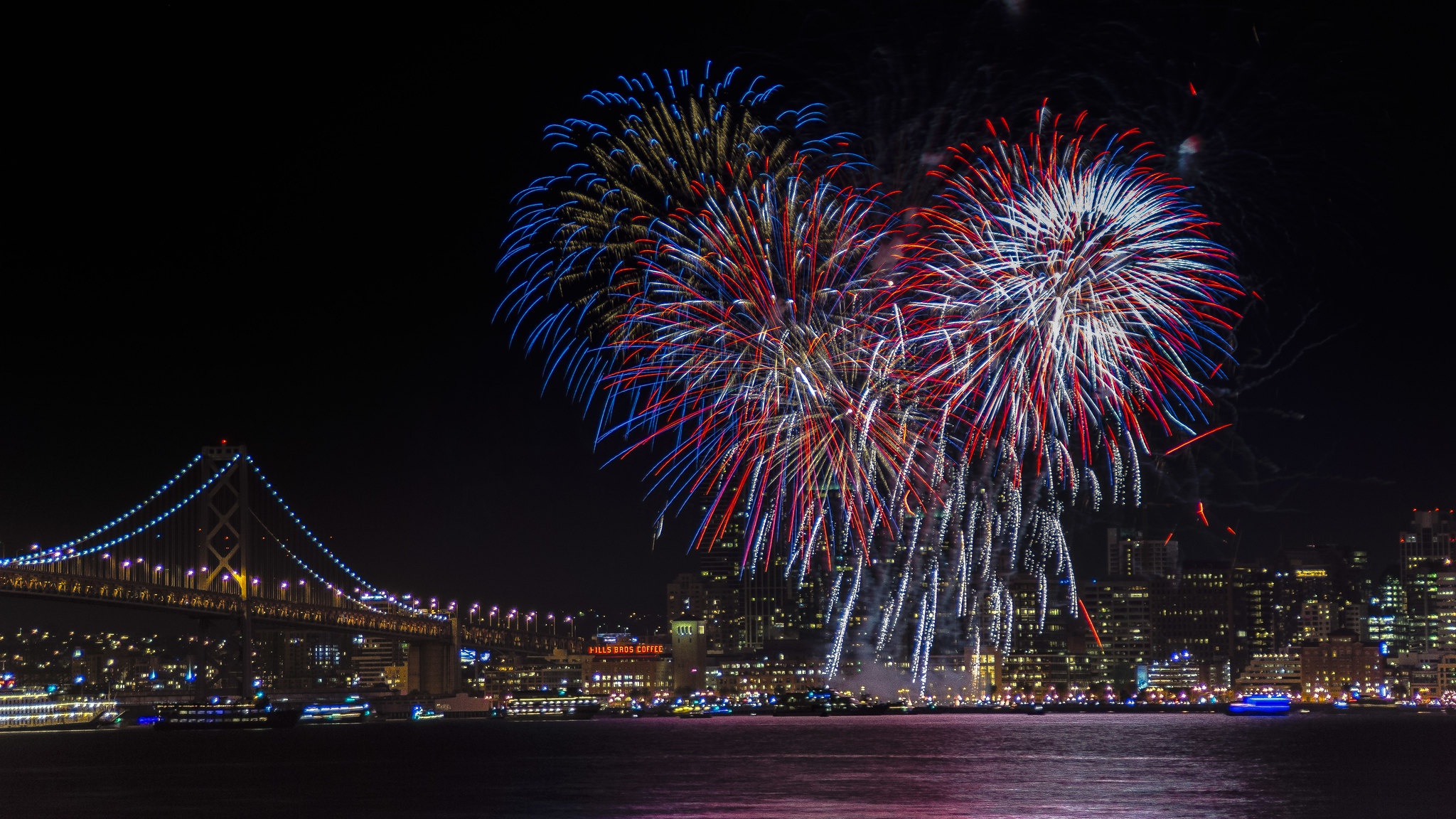 Download Skyscraper Building Bridge Photography Fireworks HD Wallpaper