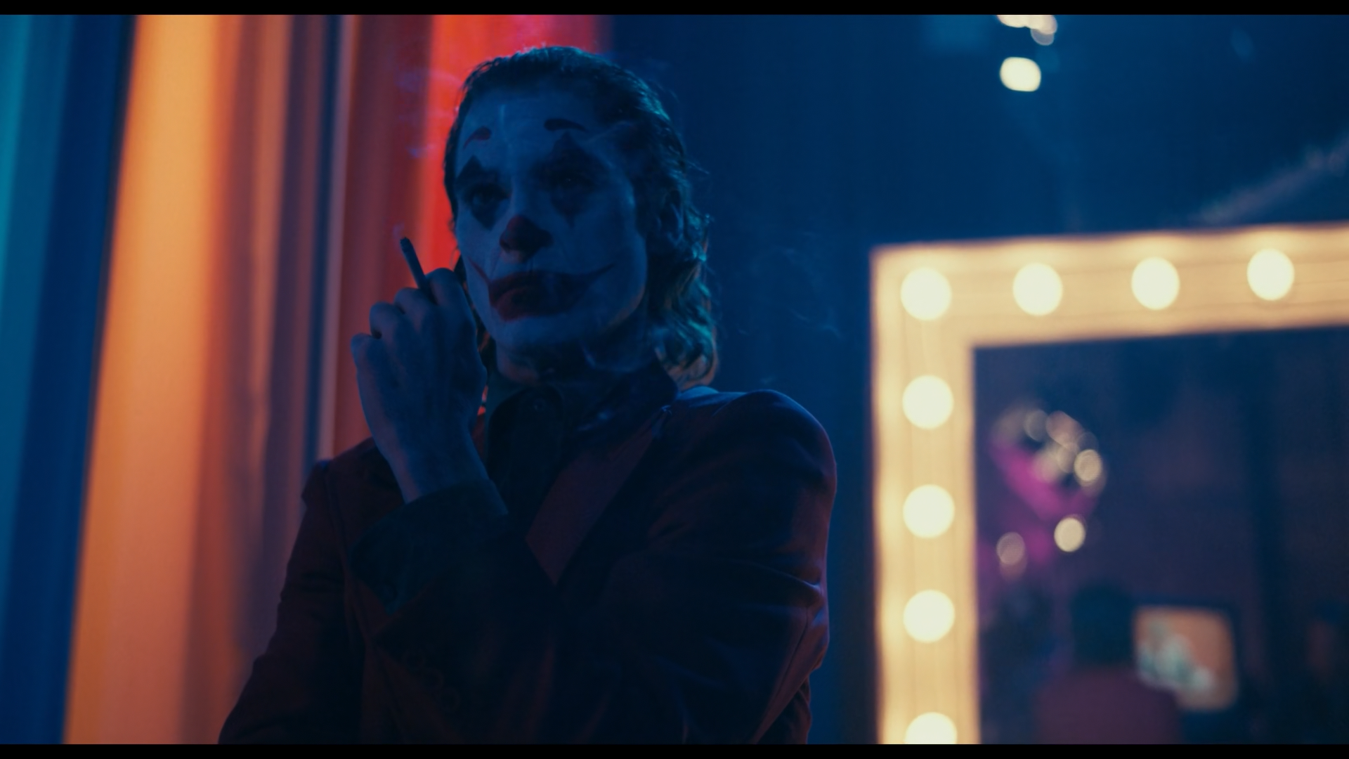 Joker HD Wallpaper: Dark Night’s Silent Smile | 1920x1080 | Wallpaper Abyss