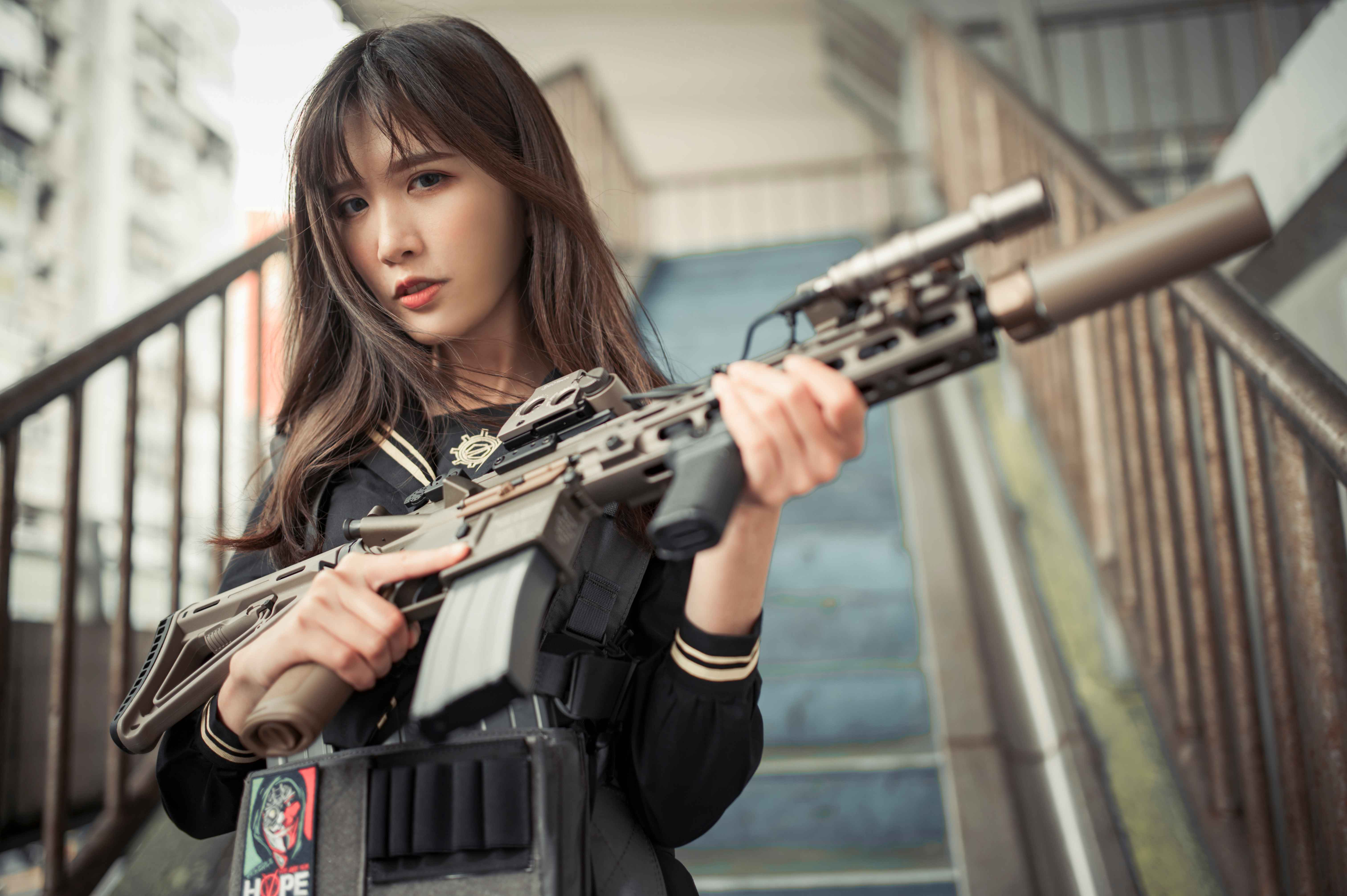 Download Asian Woman Gun 4k Ultra HD Wallpaper