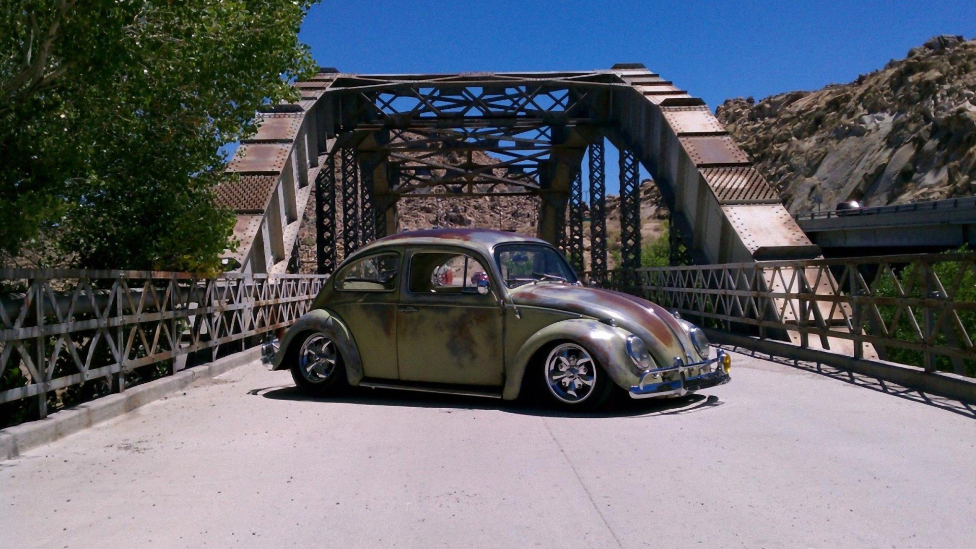 Classic Volkswagen Beetle on a Rustic Bridge - HD Vehicle Wallpaper