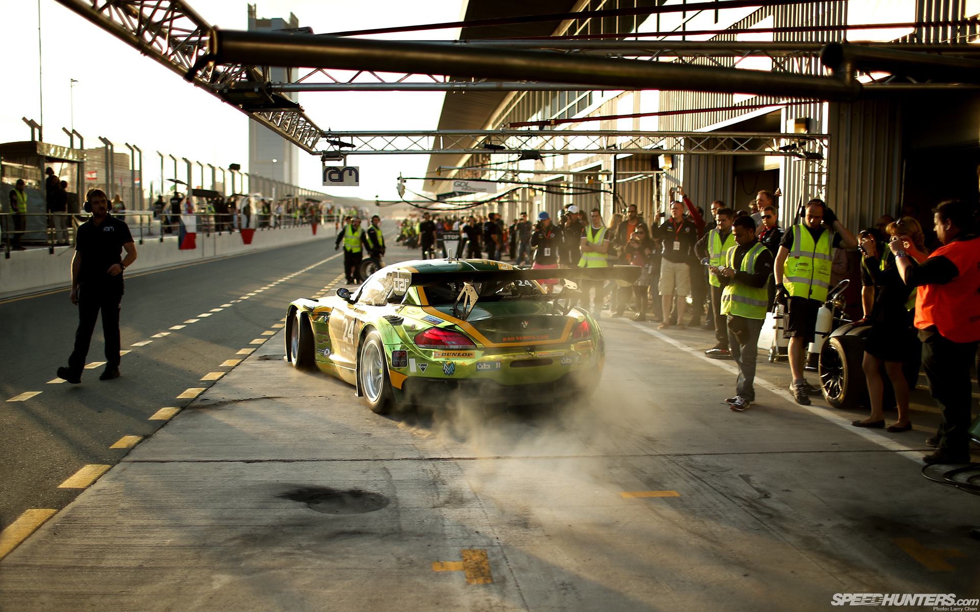 BMW Racing Thrill: HD Pit Lane Action Wallpaper