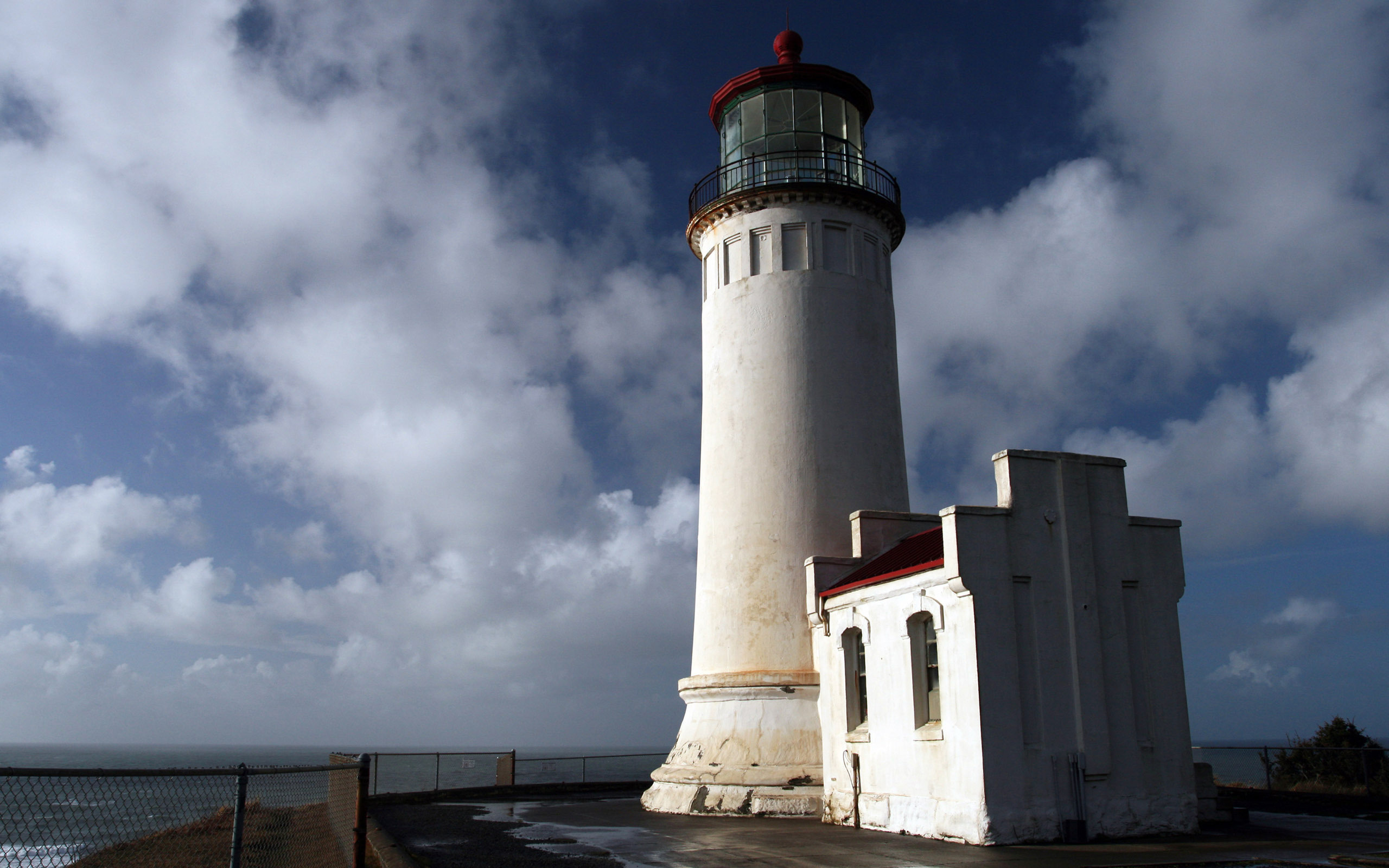 lighthouse over white cliffs by kingbonj