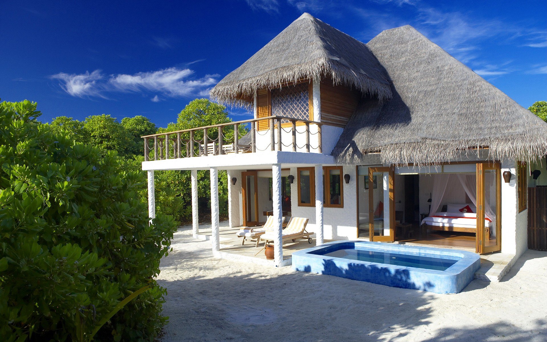 Tropical Man-Made Haven: Stunning HD House Wallpaper