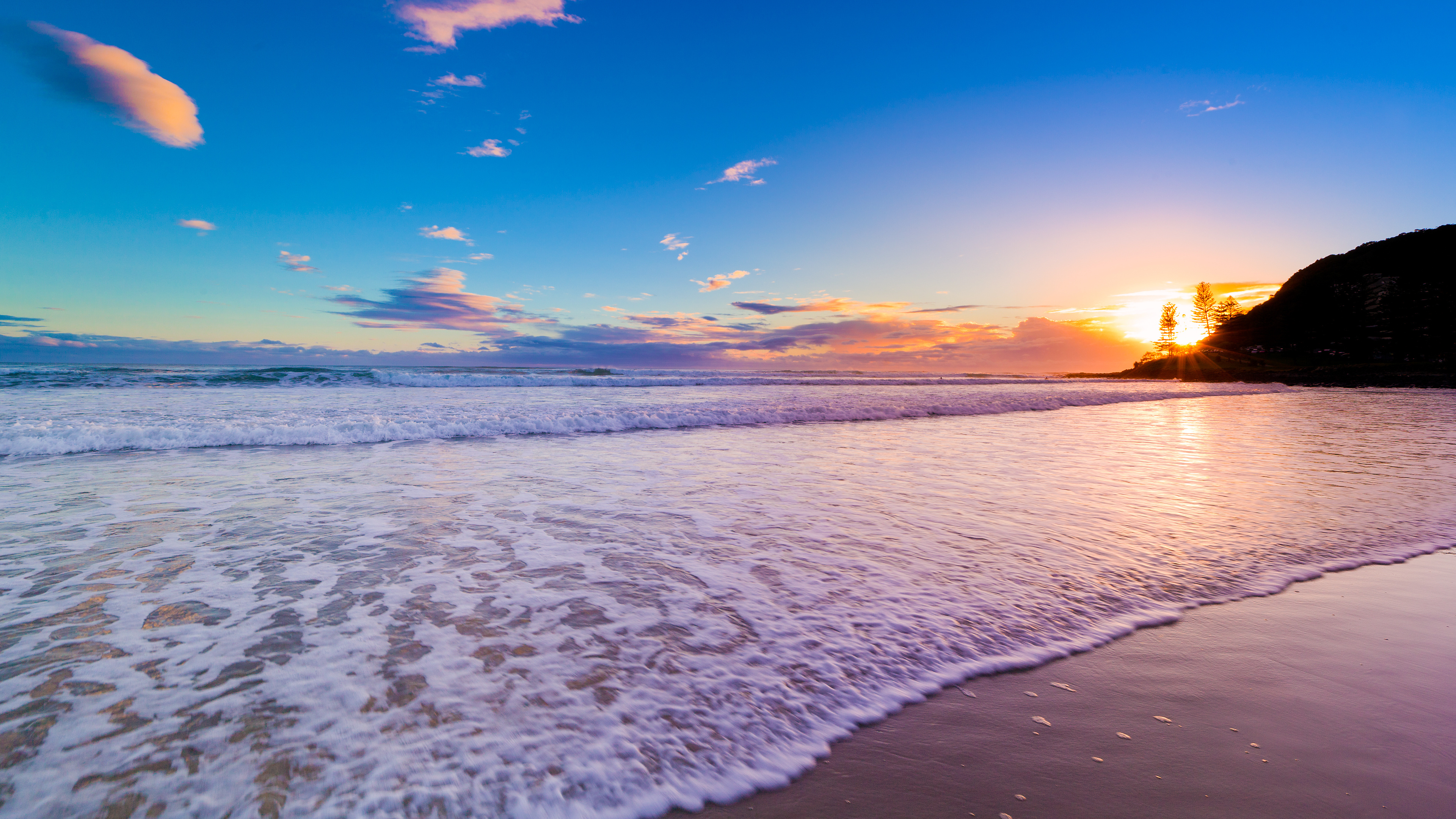 Serene Beach Sunset 4K Ultra HD Wallpaper