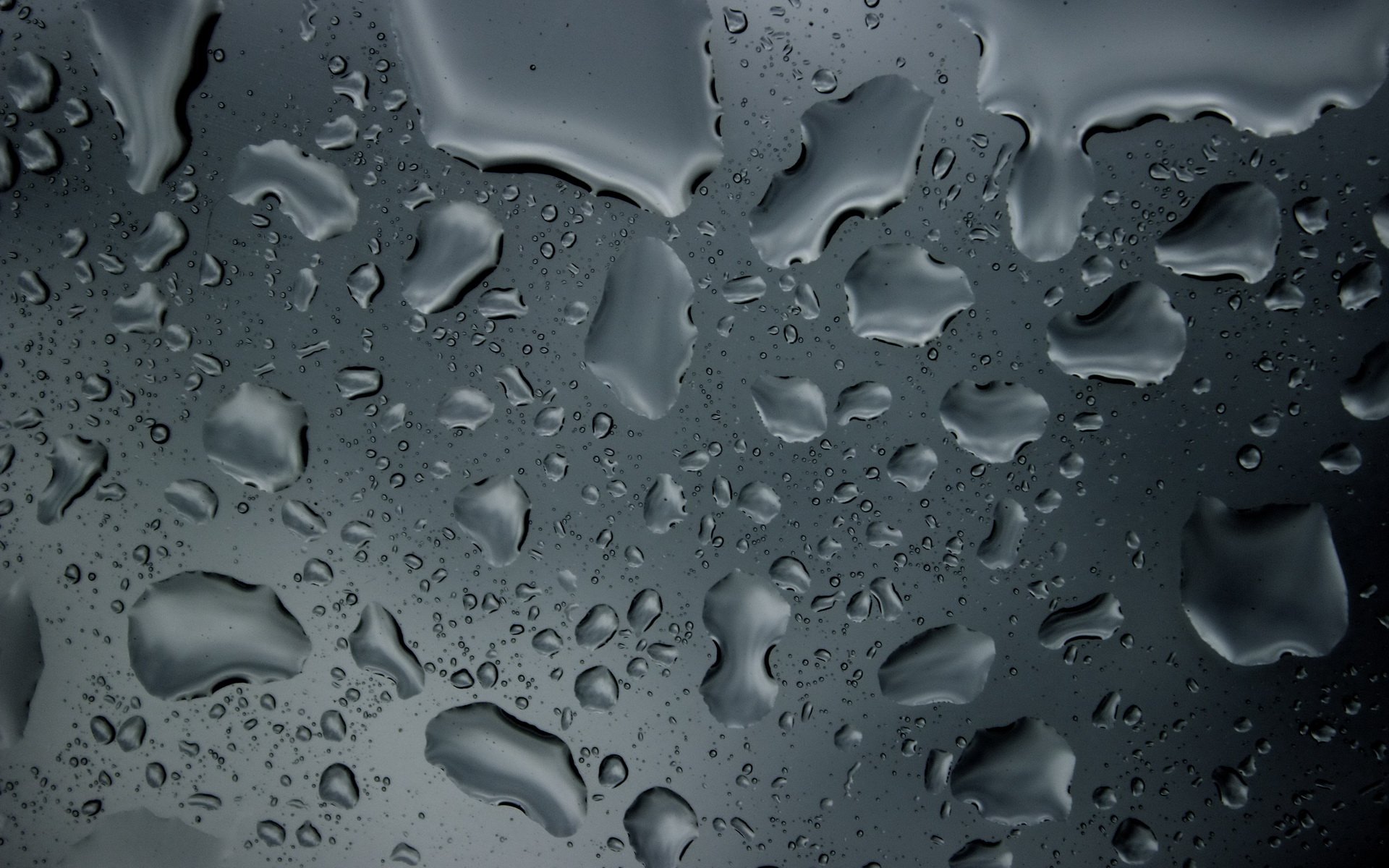 Rain-Kissed Glass: HD Raindrop Photography Wallpaper