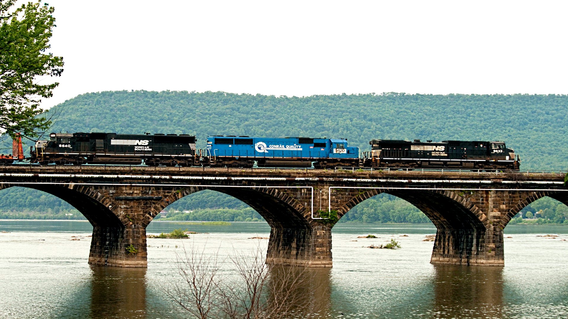 Majestic Train Journey: HD Vehicle Wallpaper Over River Bridge