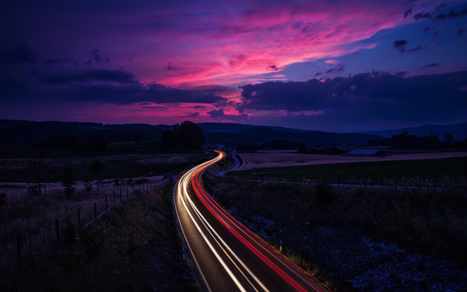 HD Time-Lapse Journey: Vibrant Trails Through Twilight