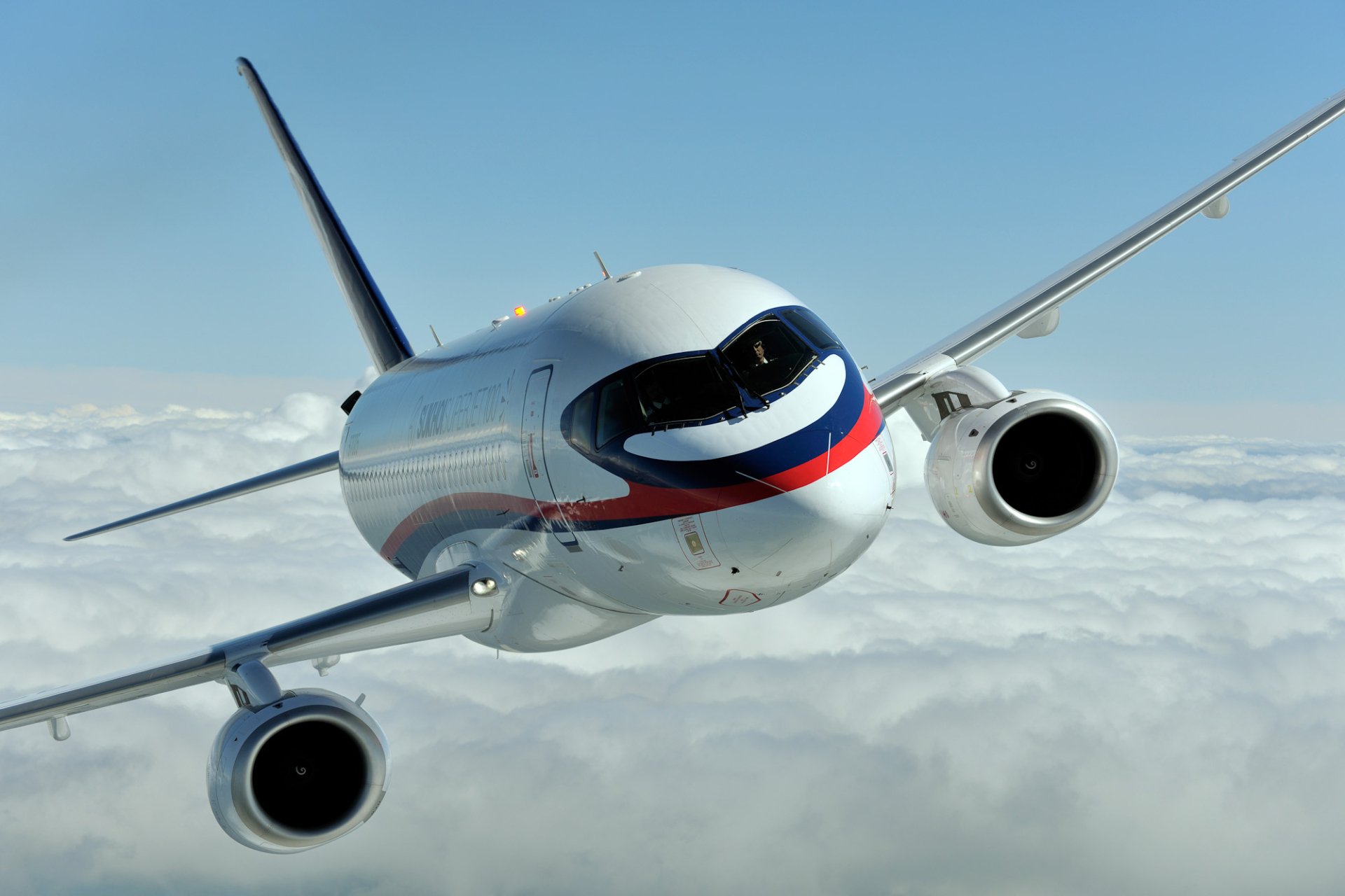 Sukhoi SuperJet 100 — HD Flight Wallpaper