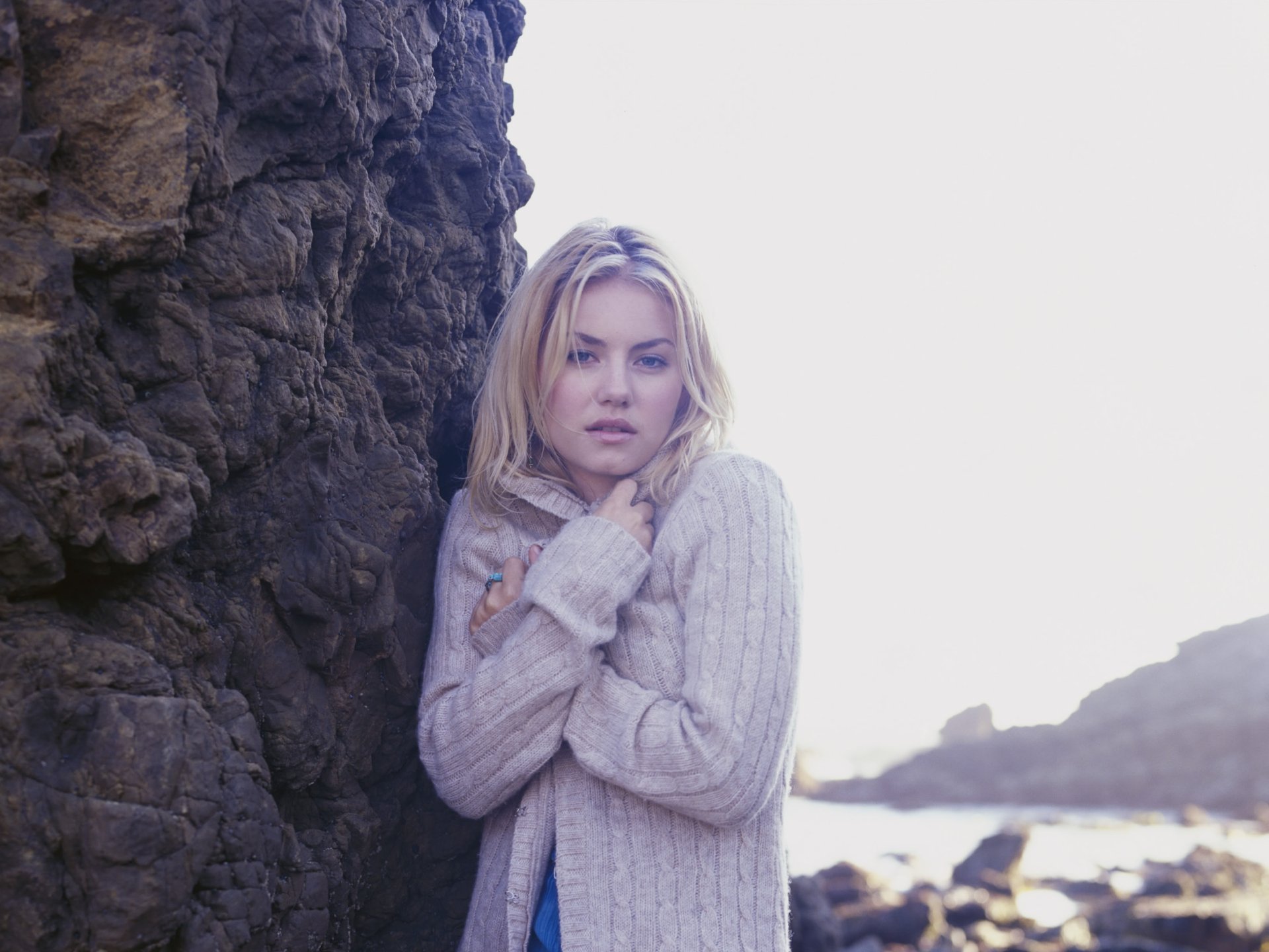 Elisha Cuthbert HD Wallpaper – Stunning Celebrity Portrait by the Rocks