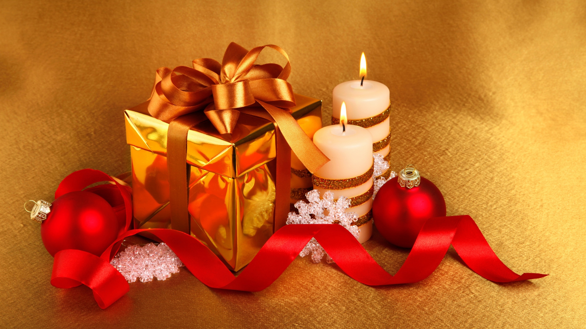 Beautifully Wrapped Christmas Present Surrounded by Candle and Holiday ...