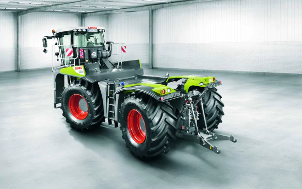 Claas Axion 990 Tractor: HD Wallpaper in a Dramatic Field Landscape