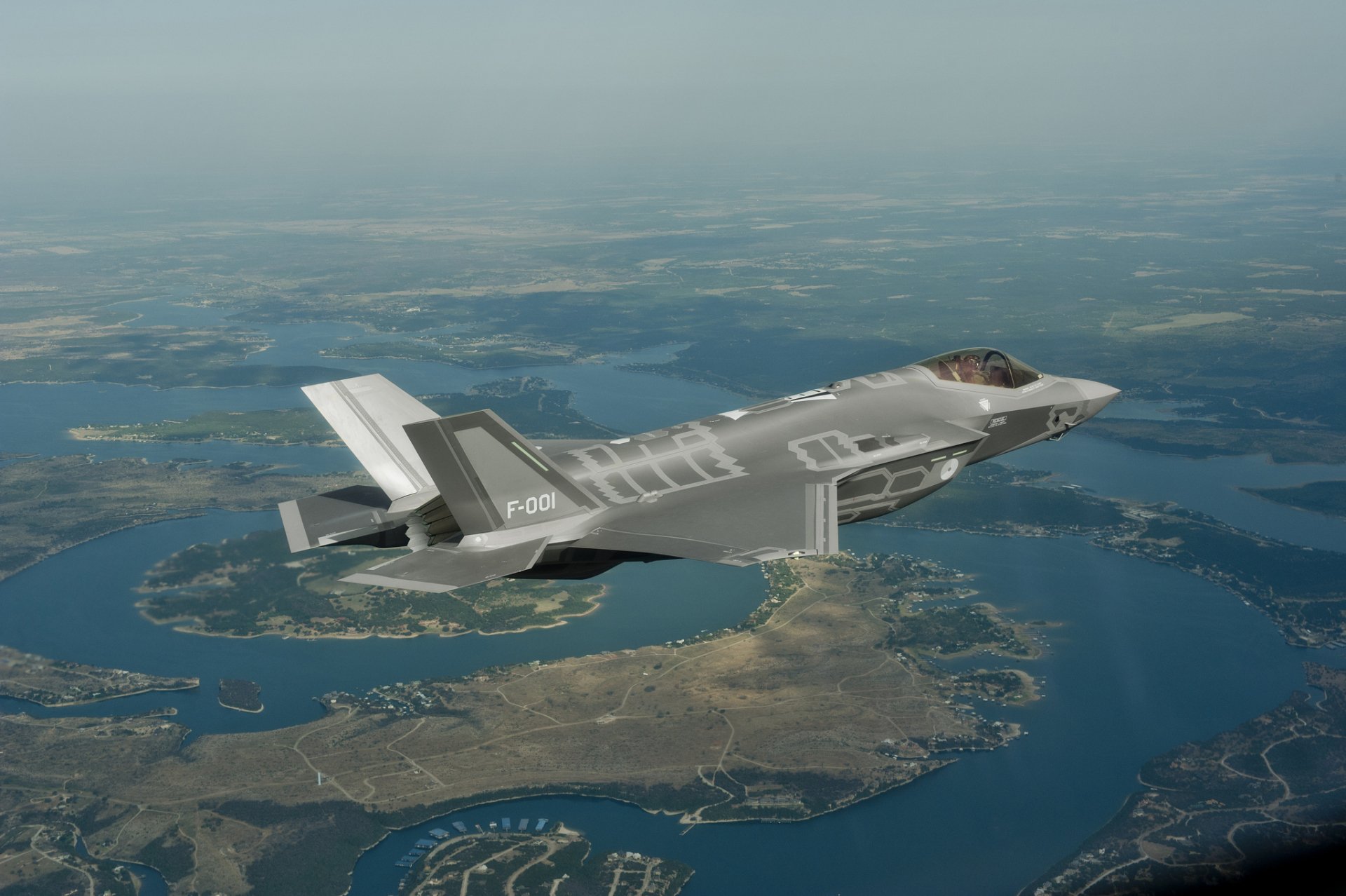 F-35 Lightning II Warplane Soaring Over Scenic Landscape – HD Military ...