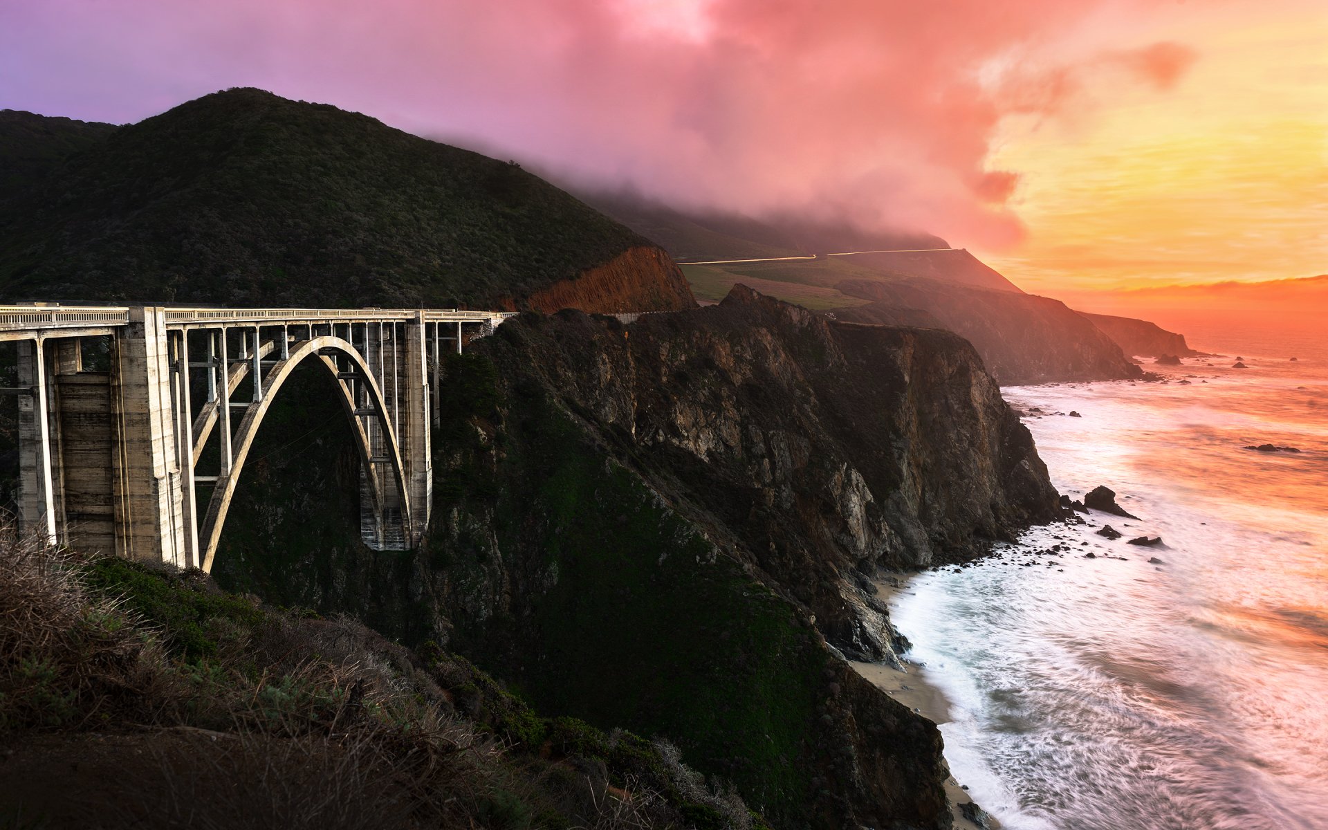 Cloud-Kissed Coastal Bridge & Mountain Road at Sunset — 2K Quad HD ...