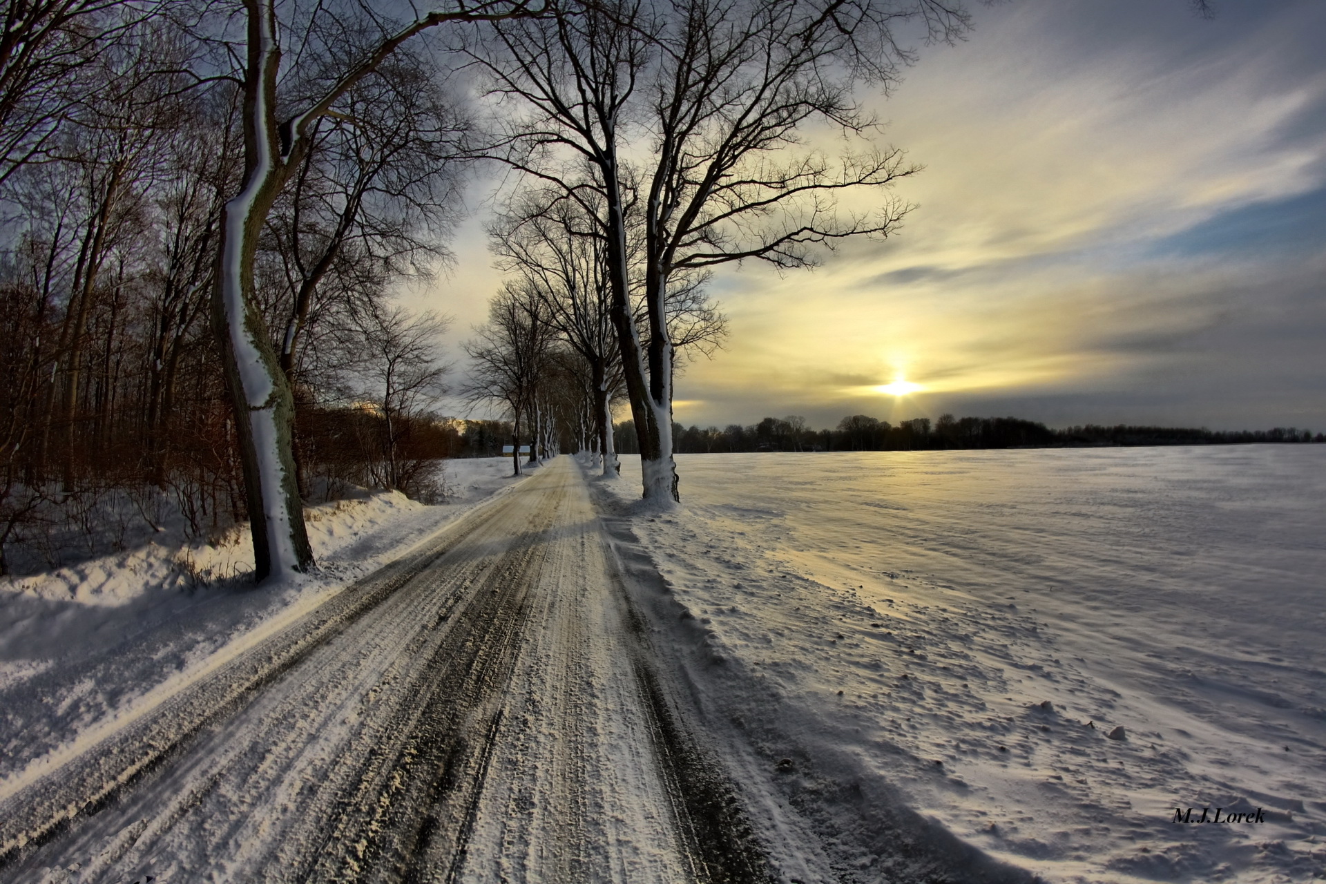 Download Sunbeam Sun Tree Snow Winter Man Made Road HD Wallpaper