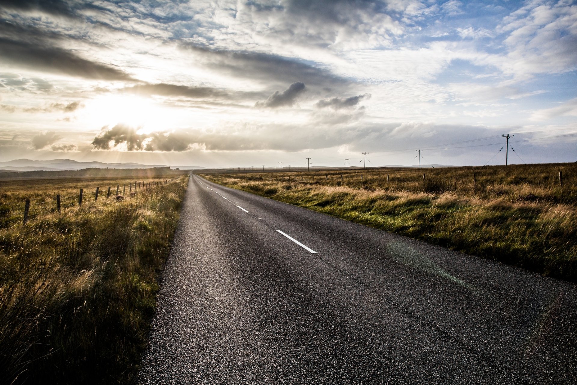 Endless Road Through Nature’s Vast Landscape Under Cloudy Skies - HD ...