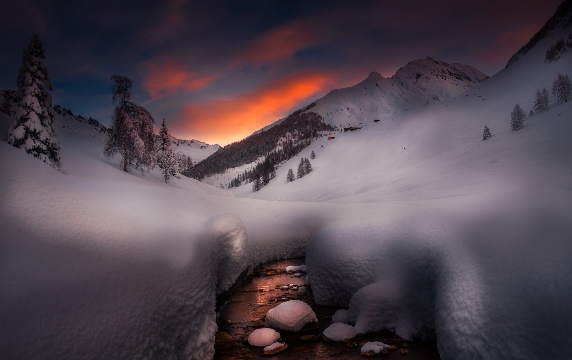 Winter Sunset Serenity: Snowy Stream in Majestic Nature HD Wallpaper